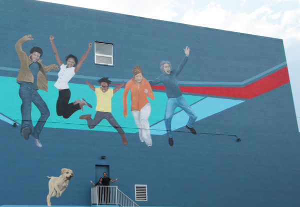Creating a large scale art mural on a building - The Color Dreamers